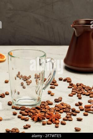 Cinnamon sticks, anise stars and black peppercorns on textured ...