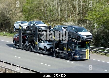 Carlson car transporter carrying new Jaguar cars, Birmingham, UK Stock ...
