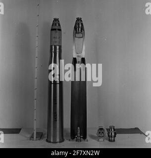 A complete 57 mm grenade (explosive and pushing load) with a cross ...