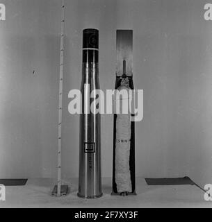 A complete 57 mm grenade (explosive and pushing load) with a cross ...