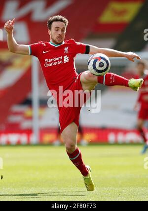 Liverpool, England, 10th April 2021. Diogo Jota of Liverpool challenged ...