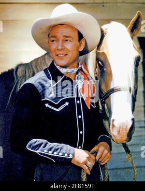 ROY ROGERS (1911-1998) American film actor with his horse Trigger about ...