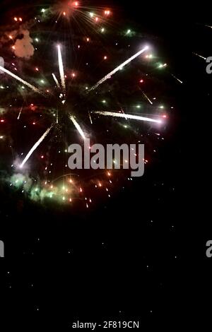 Closeup shot of colorful fireworks in the dark night sky - celebration ...