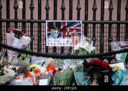 Portraits of Prince Philip seen next to flowers during the tribute ...