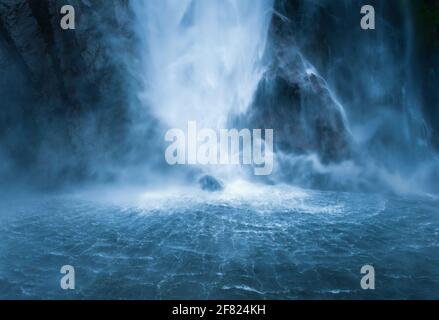 Stirling Falls plunging vertically into Milford Sound, South Island ...