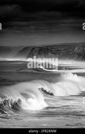 A set of waves breaking at the Bordeira Beach (Praia da Bordeira) in ...