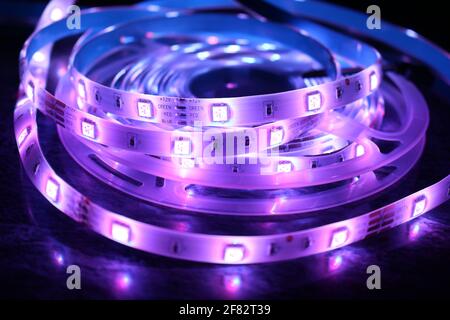 A closeup shot of a roll of illuminated purple led lights Stock Photo ...