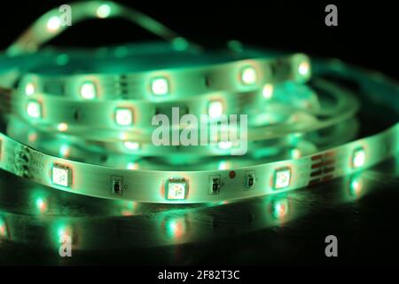 A closeup shot of a roll of illuminated green led lights Stock Photo ...