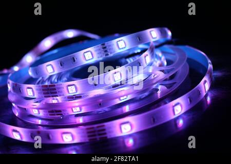 A closeup shot of a roll of illuminated purple led lights Stock Photo ...