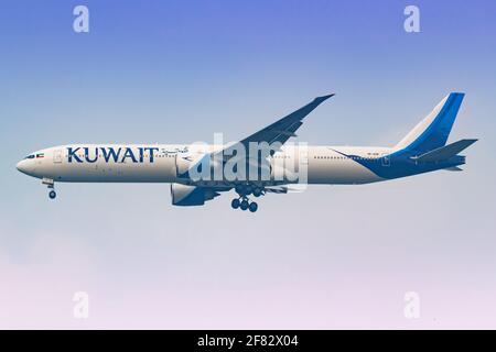 Kuwait Airways Boeing 777-300 aircraft as seen on final approach flying ...