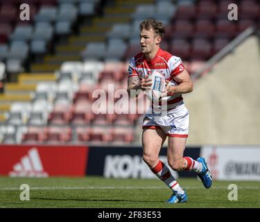 Leigh, UK. 11th Apr, 2021. Jack Cogger (16) of Huddersfield Giants in ...