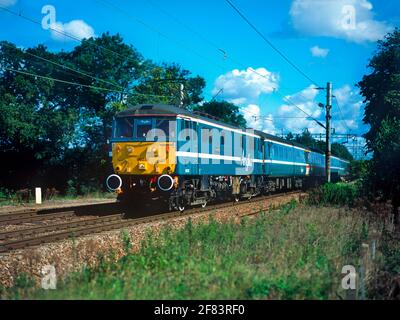 Class 86 electric locomotive number 86256 with a matching rake of ...