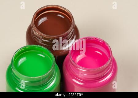 3 open gouache paint glass opened align Stock Photo - Alamy