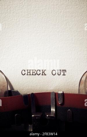 Check out word written with a typewriter Stock Photo - Alamy