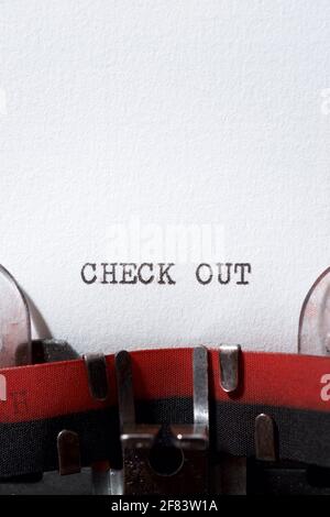 Check out word written with a typewriter Stock Photo - Alamy