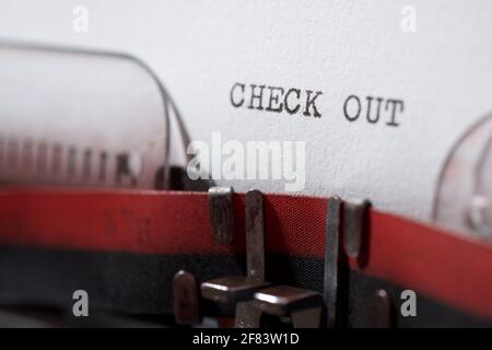 Check out word written with a typewriter Stock Photo - Alamy