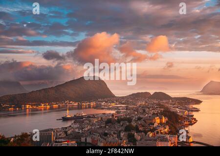 Alesund, Norway. Amazing Natural Bright Sunset Dramatic Sky In Warm ...
