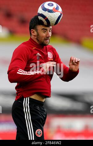 Sheffield, UK. 11th Apr, 2021. Ben Osborn of Sheffield Utd tussles with ...