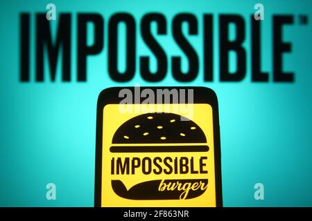 In this photo illustration the Impossible Foods logo is seen on a ...