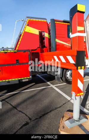 Retractable ladder on a fire truck with a control panel for ...