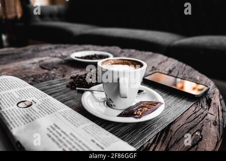 VALENCIA, SPAIN - Mar 31, 2021: Full breakfast at an oak table, with ...