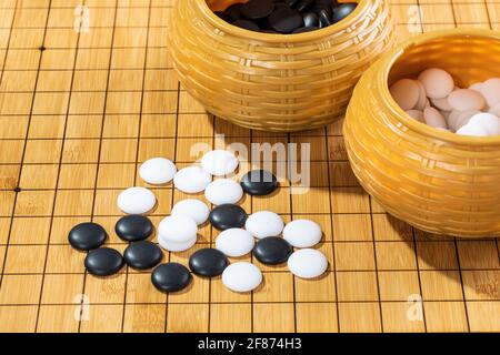 High angle shot of baskets of checkers pawns and the wooden boar Stock ...