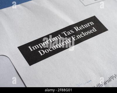 Envelope with important tax return document enclosed Stock Photo - Alamy