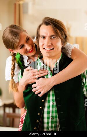 Female Innkeeper in traditional Bavarian clothes in pub Stock Photo - Alamy