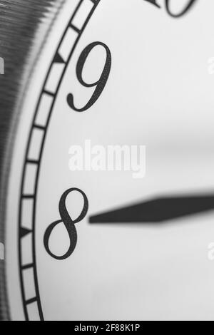Classic analog clock pointing at eight thirty five, isolated on white ...