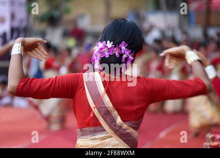 Guwahati, Assam, India. 12th Apr, 2021. A women wrap 'Kopou Phool ...