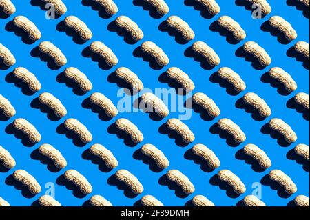 Pattern of cashew. Fashionable sunny porridge pattern on a bright blue ...