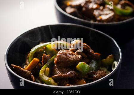 Chinese sizzling beef stir-fry Stock Photo - Alamy