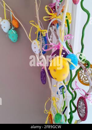 Colorful Easter decorations hanging on tree branches Stock Photo - Alamy