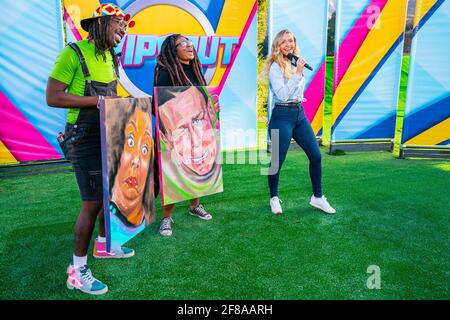 WIPEOUT, host Camille Kostek (right) with contestants, (Season 1 ...