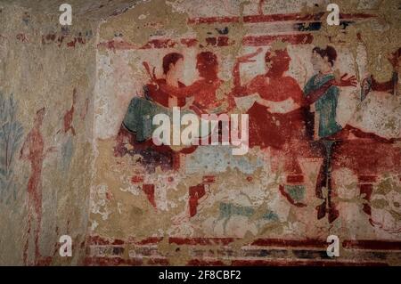 ancient frescoes in the tomb in the necropolis of Paestum Stock Photo ...
