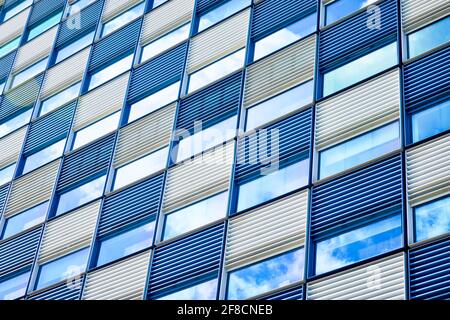 Modern building facade with widnows close up Stock Photo - Alamy