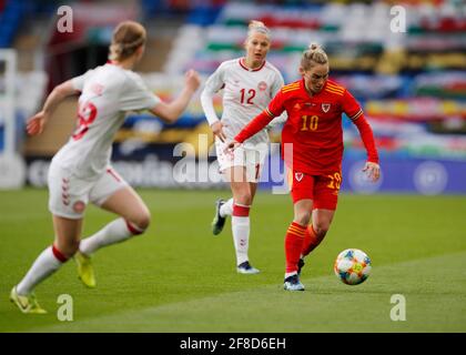 Cardiff, Wales. 13 April, 2021. Assistant Referee Emily Carney warming ...