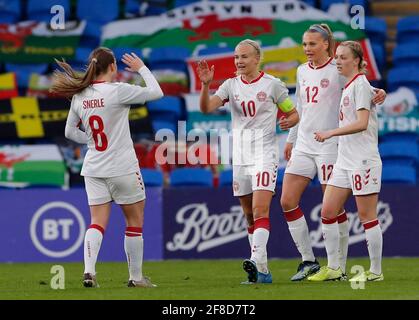 Cardiff, Wales. 13 April, 2021. Assistant Referee Emily Carney warming ...