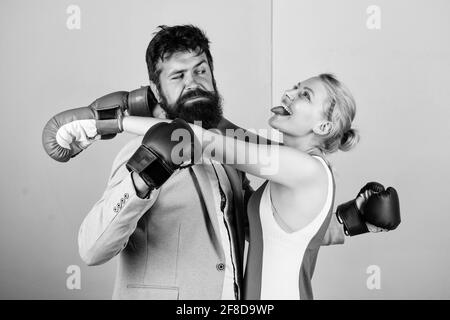Couple in love competing boxing. Conflict concept. Family life ...