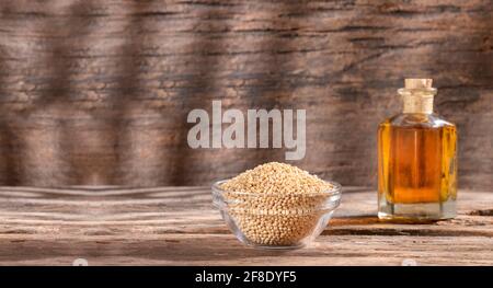 White millet seeds with oil bottle - Healthy food Stock Photo - Alamy
