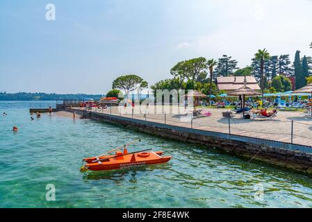 Beach at Gardone Riviera situated at Lago di Garda in Italy Stock Photo ...