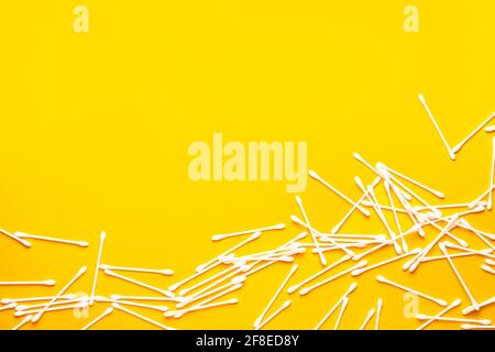 Yellow cotton swabs scattered on the surface Stock Photo - Alamy