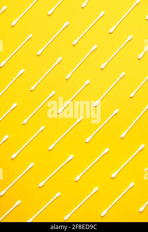 Yellow cotton swabs scattered on the surface Stock Photo - Alamy