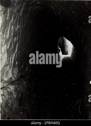 Snow tunnel on the red wall Stock Photo - Alamy