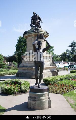 Statue of Prince Hal with Shakespeare statue in background in Stratford ...