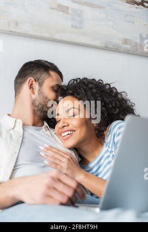 Cheerful african american woman chilling alone at home, copy space ...