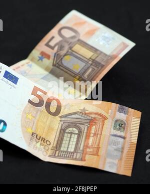 new and old 50 euro banknotes stand on black background Stock Photo - Alamy