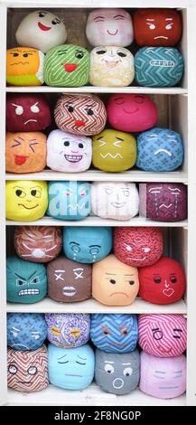 Lots of handmade colored smiley faces soft toys, handmade colored ...