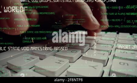 Creative visual of computer programming coding and software development shown by man working on ...