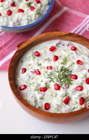 Pomegranate and Cucumber Raita. Indian Fresh sauce or condiment called ...